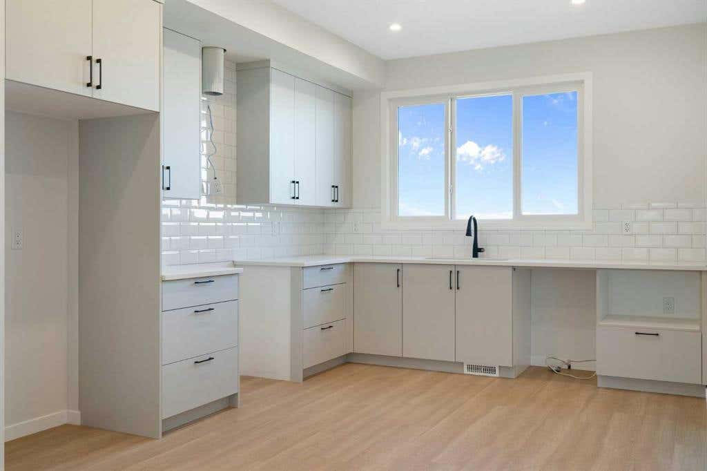 1017 Creekview Drive SW, Calgary, AB T2X 5X6 Duplex For Sale | RE/MAX | A2181148